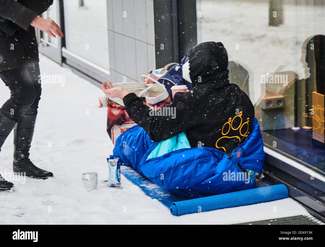 Berlin, Germany. 08th Feb, 2021. A homeless man wearing an FFP2 mask in ...