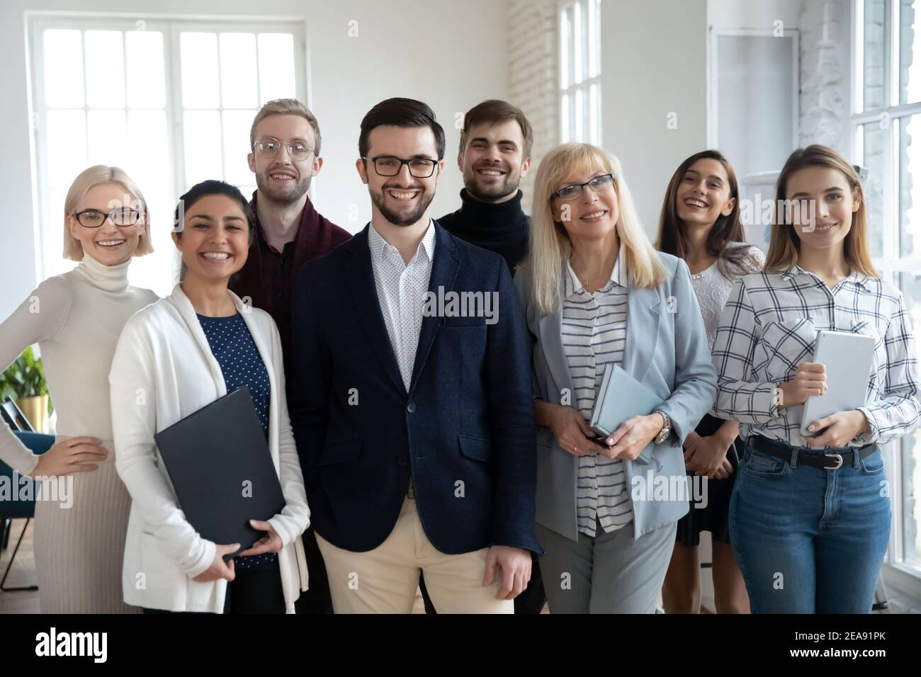 Group portrait of happy diverse colleagues of different ages Stock ...