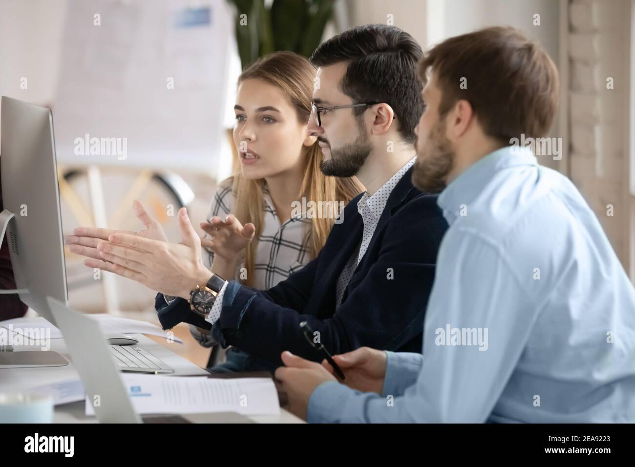 Group focused people office team hi-res stock photography and images ...