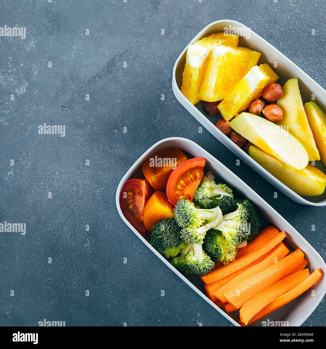 Lunch box with vegetables and fruits. Delicious balanced food concept ...