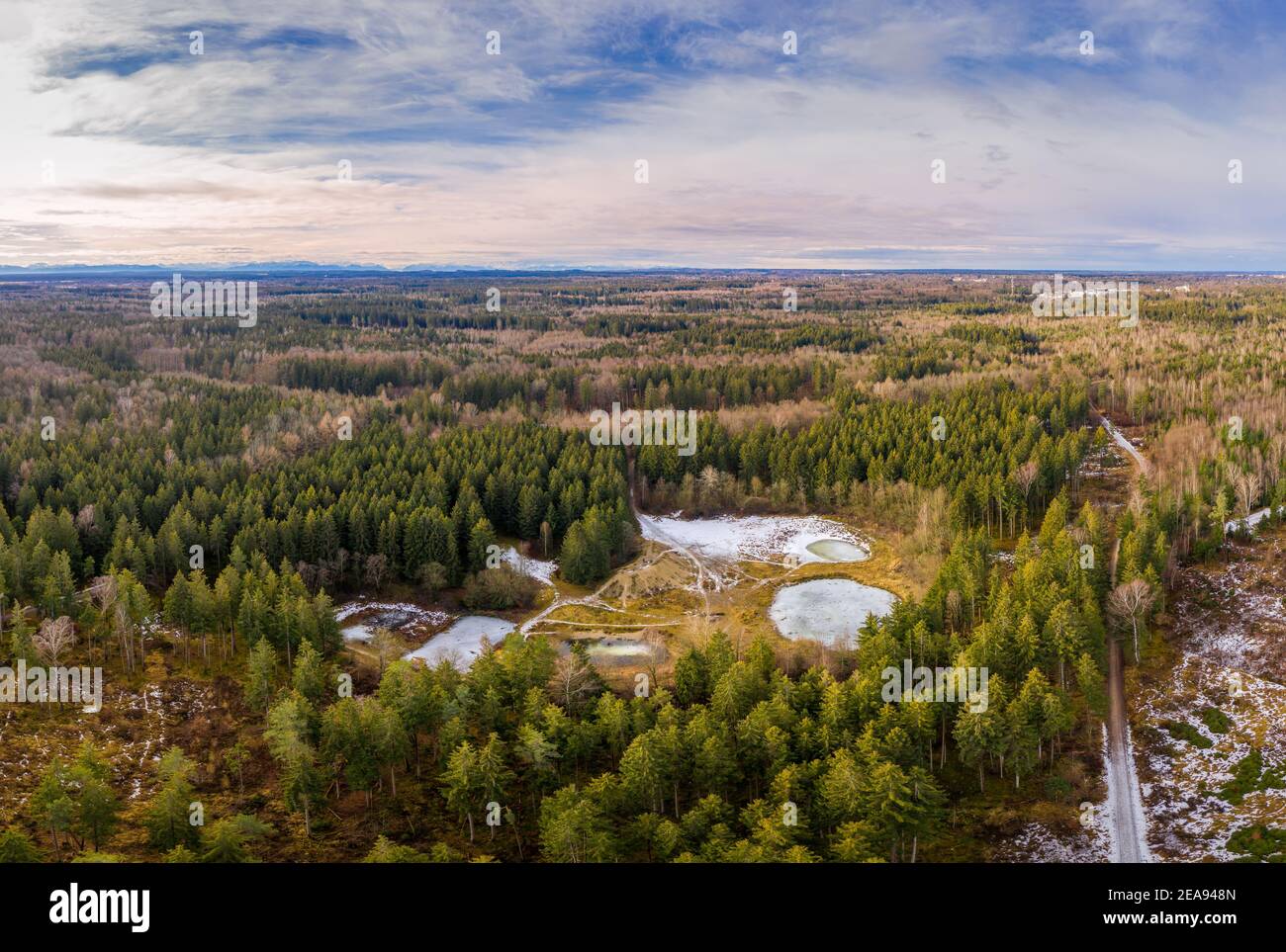 Very small lake in a forest in winter hi-res stock photography and ...