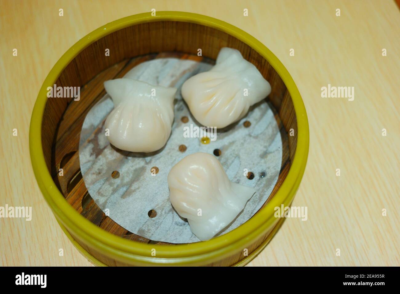 Closeup shot of dumplings in a wooden bowl Stock Photo - Alamy