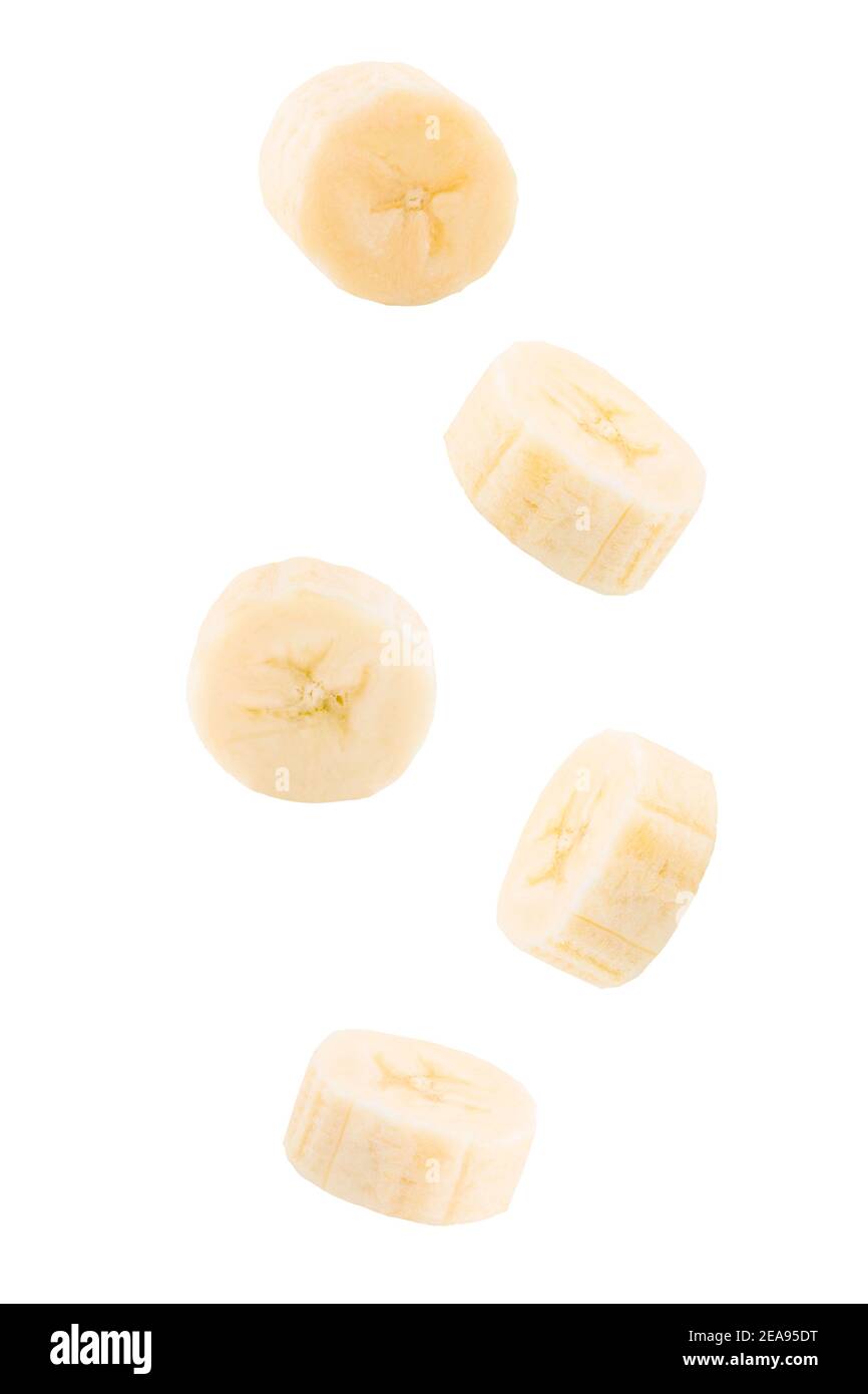 Flying fresh peeled sliced banana fruits on white background Stock ...