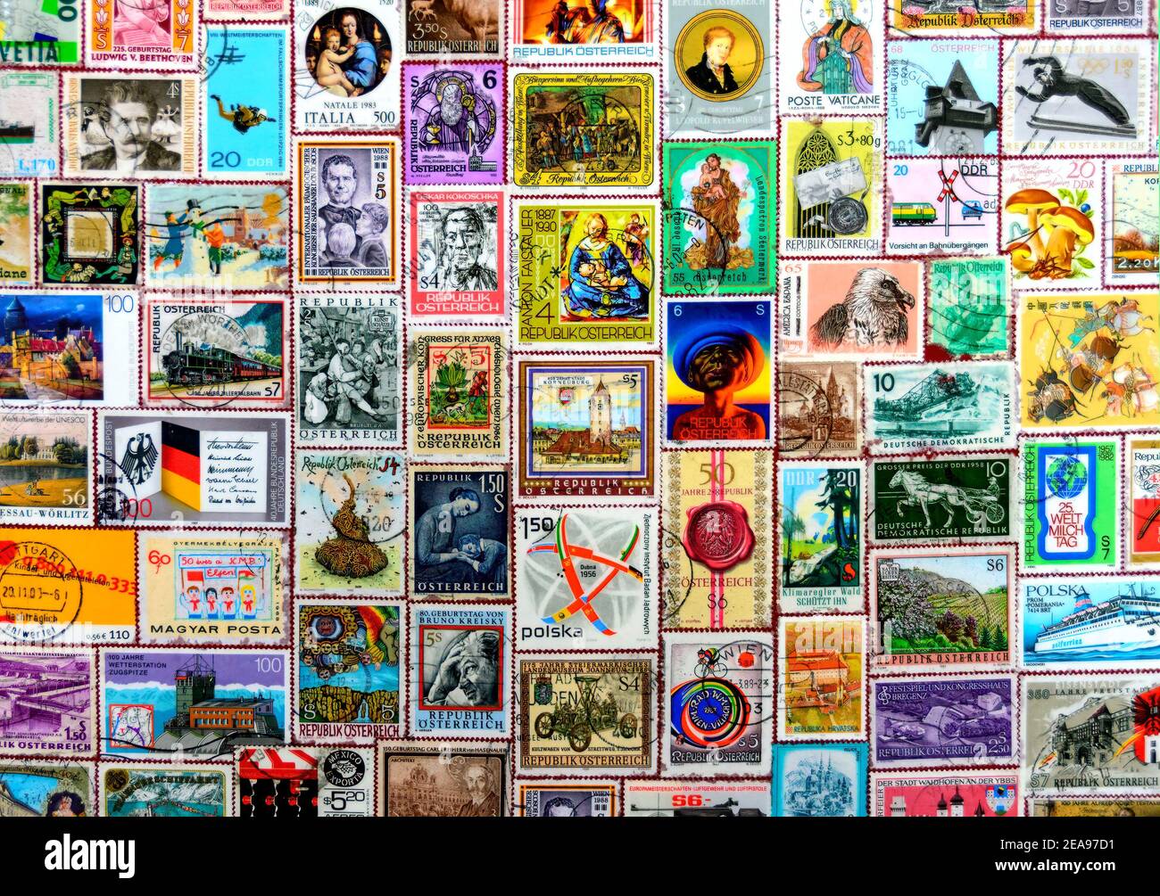 wall plastered with postage stamps from different european countries ...