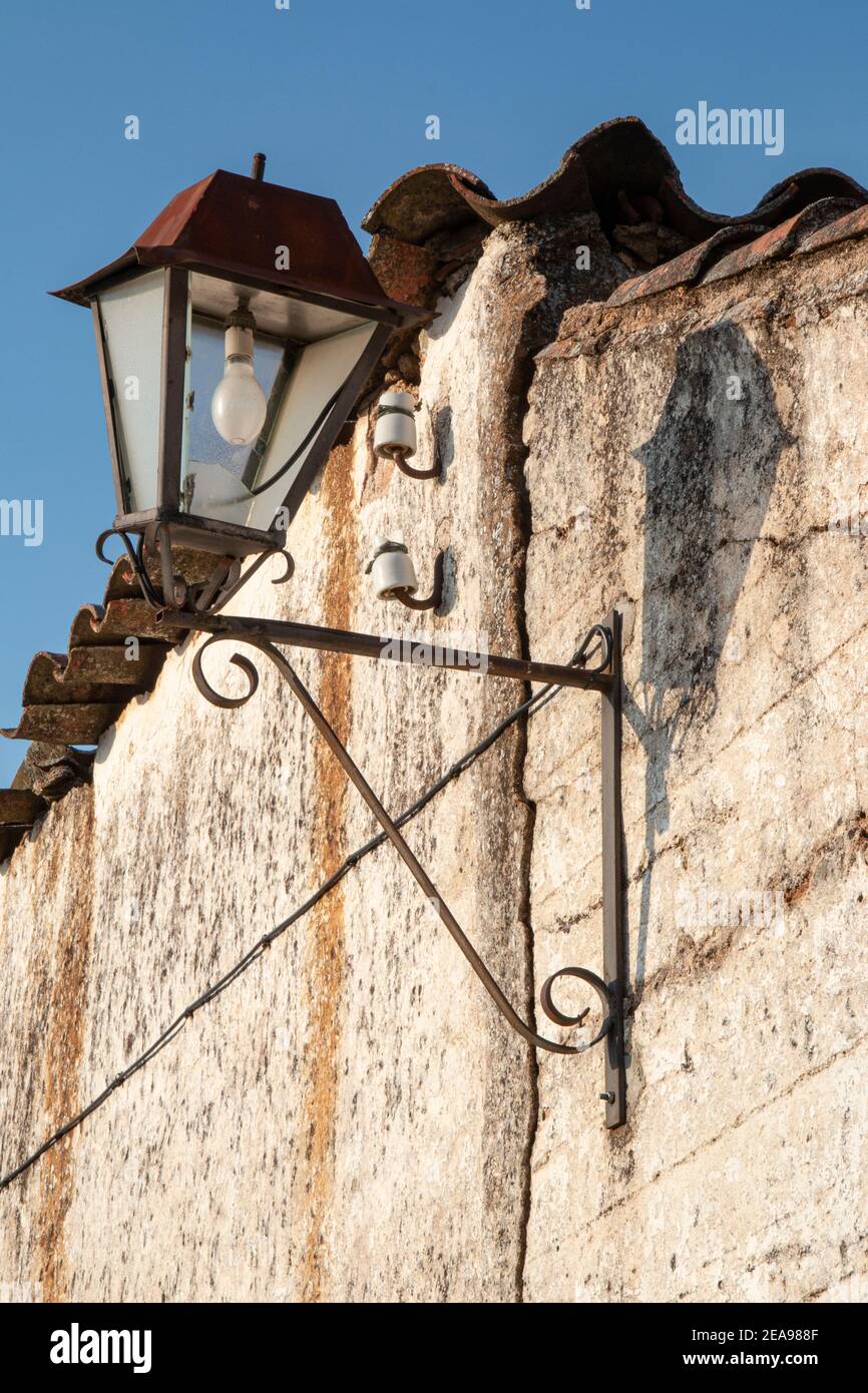 Old broken rustic village lamppost Stock Photo - Alamy
