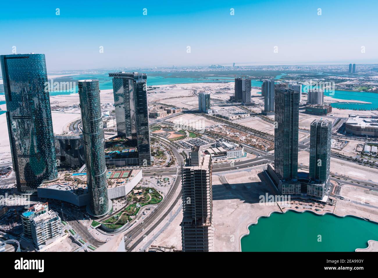 Aerial view of big modern city | Abu Dhabi city Al Reem Island | Middle ...