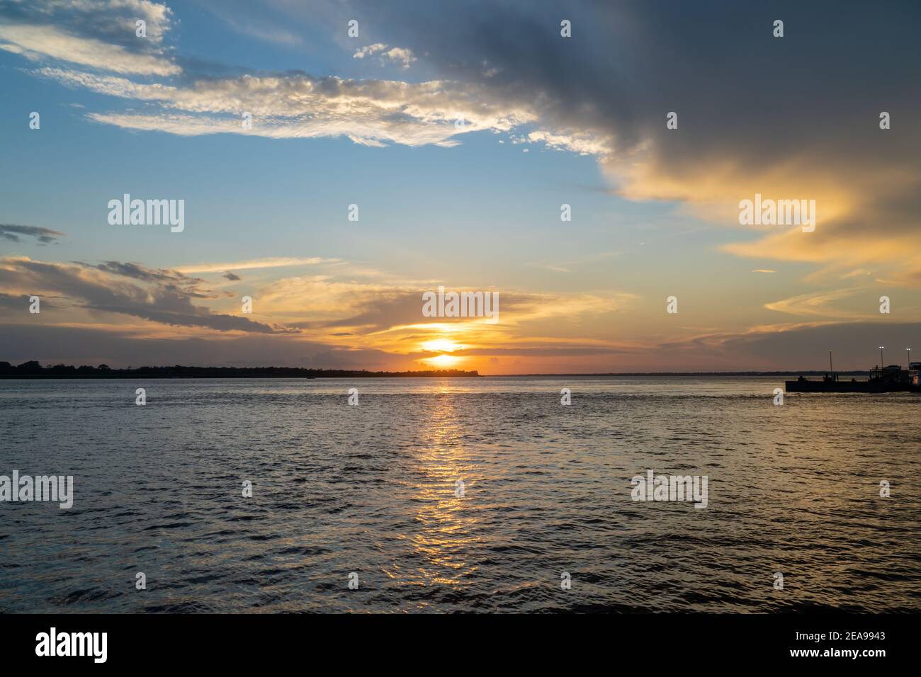 Beautiful sunset view on the Amazon River and colorful clouds. Amazonas ...