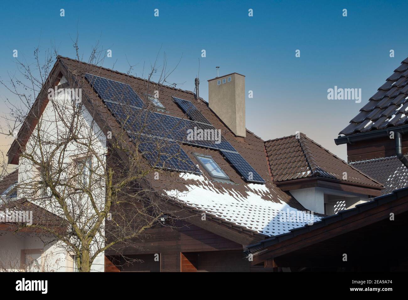 Residential house roof with solar panels Stock Photo - Alamy