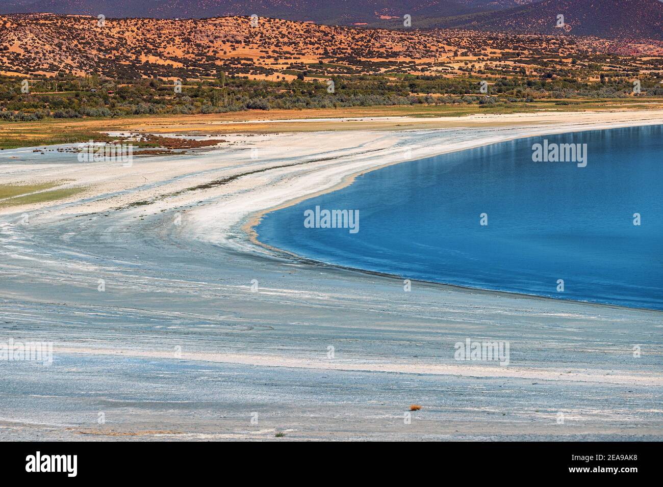 Lake Burdur in Turkey, which dries up in the summer heat, exposes the ...