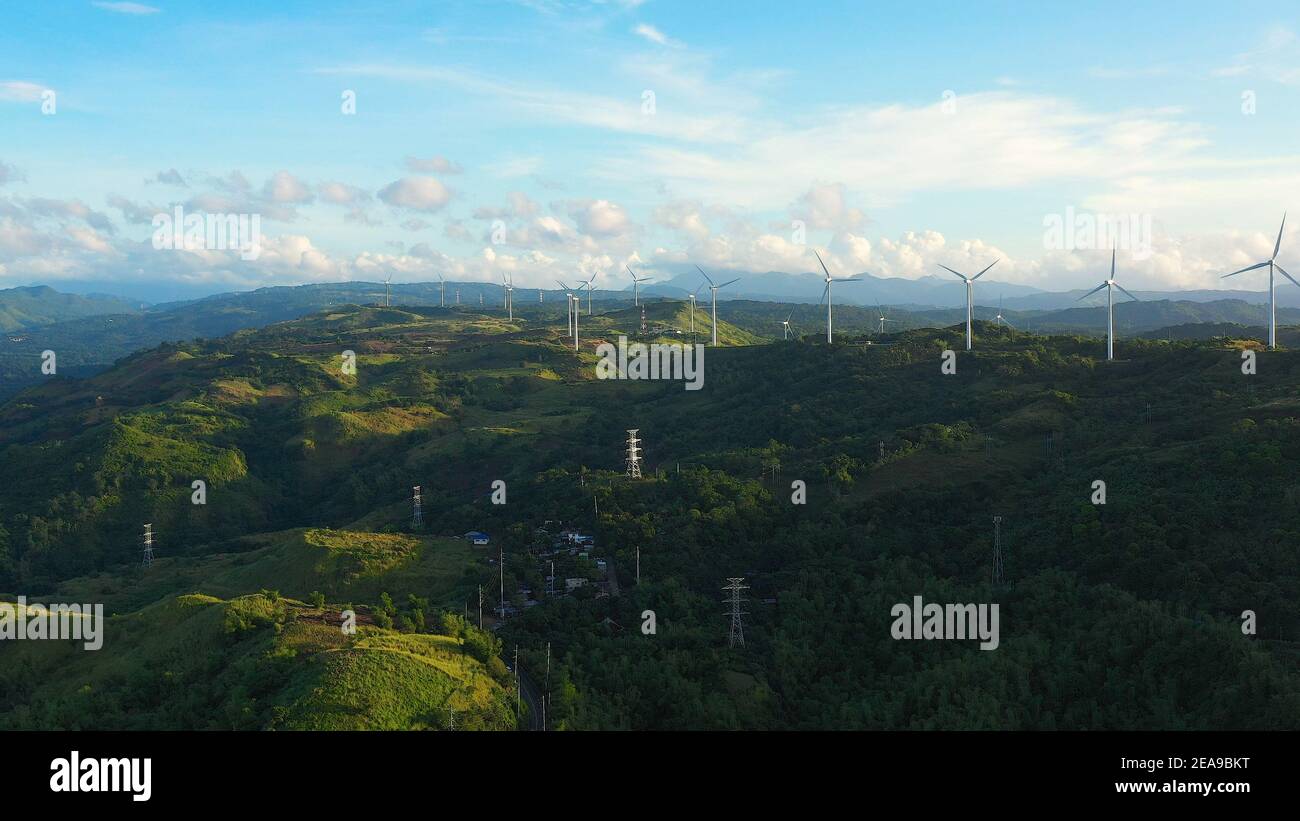 Windm ills and a wind farm on the hillsides. Philippines, Luzon. Wind ...