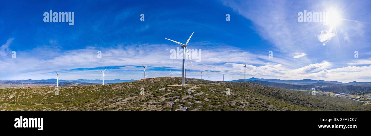 Wind turbines on the hill. Wind farm panorama. Green ecological power ...