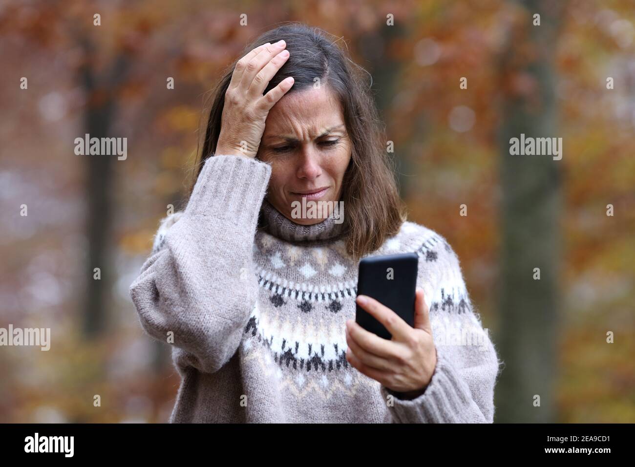 Woman bad news phone call mature sad hi-res stock photography and ...