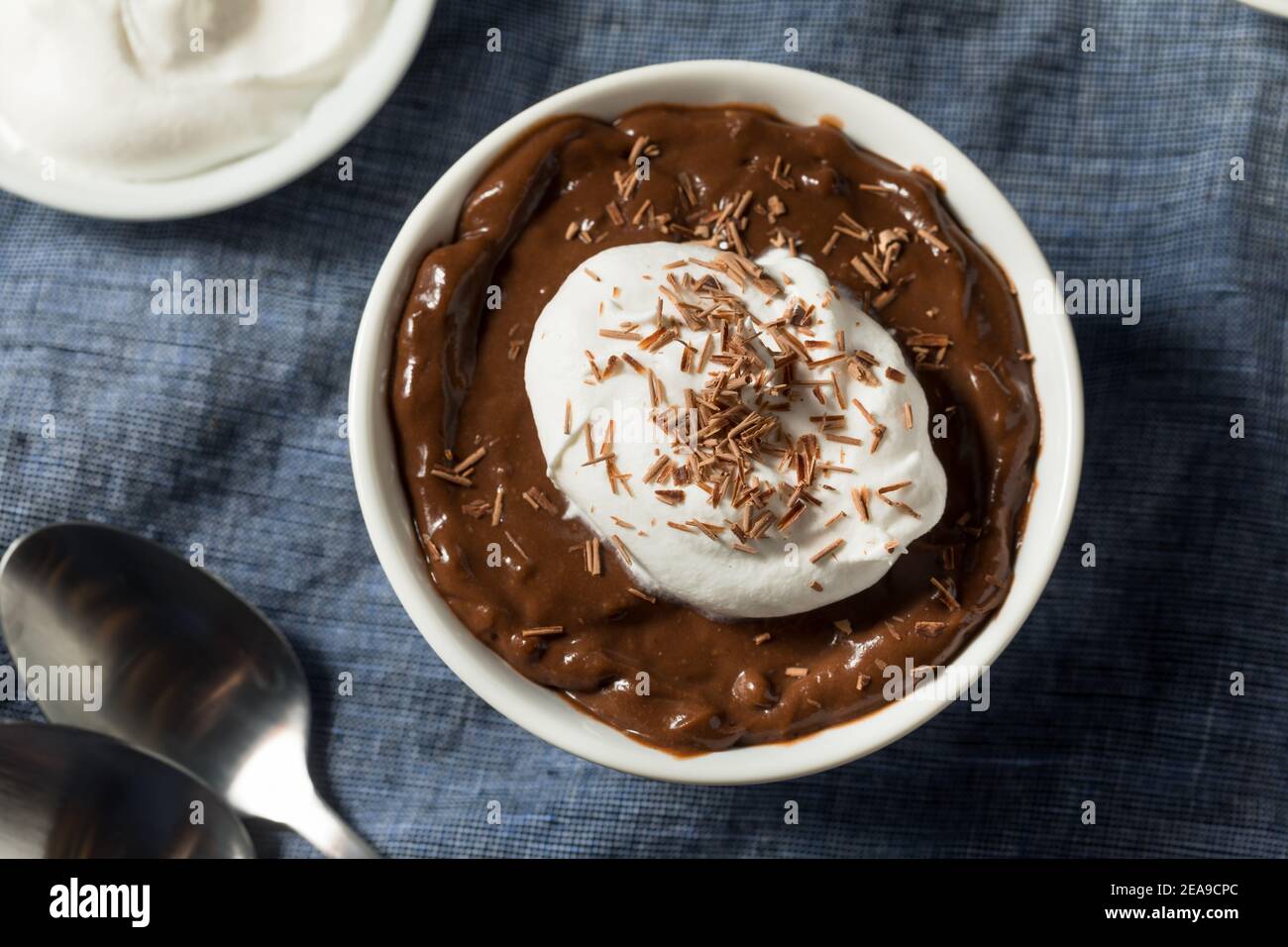 Sweet Homemade Chocolate Pudding in a Bowl with Whipped Cream Stock ...