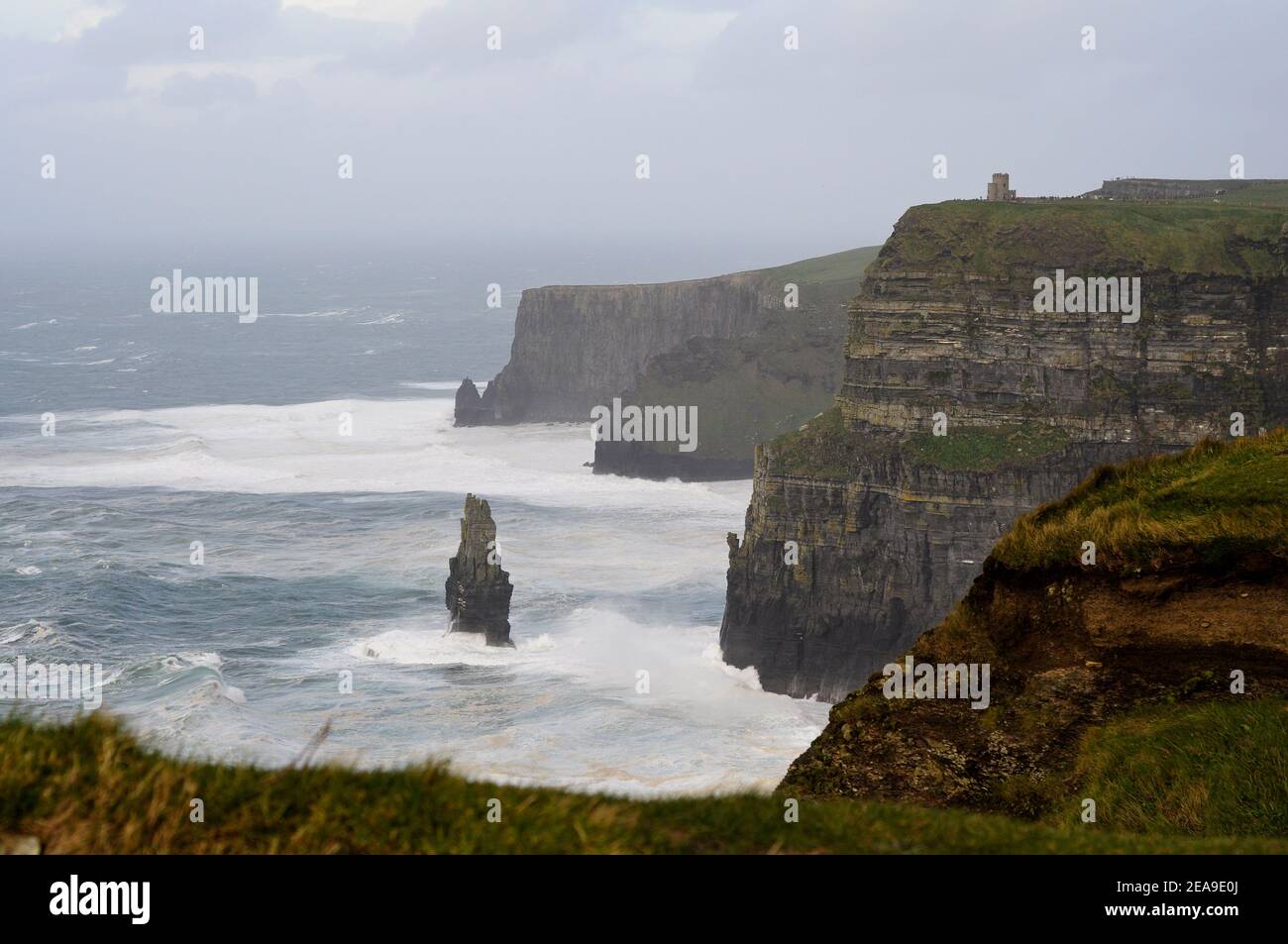 Rough seas and coastline at the Cliffs of Moher in Ireland Stock Photo ...