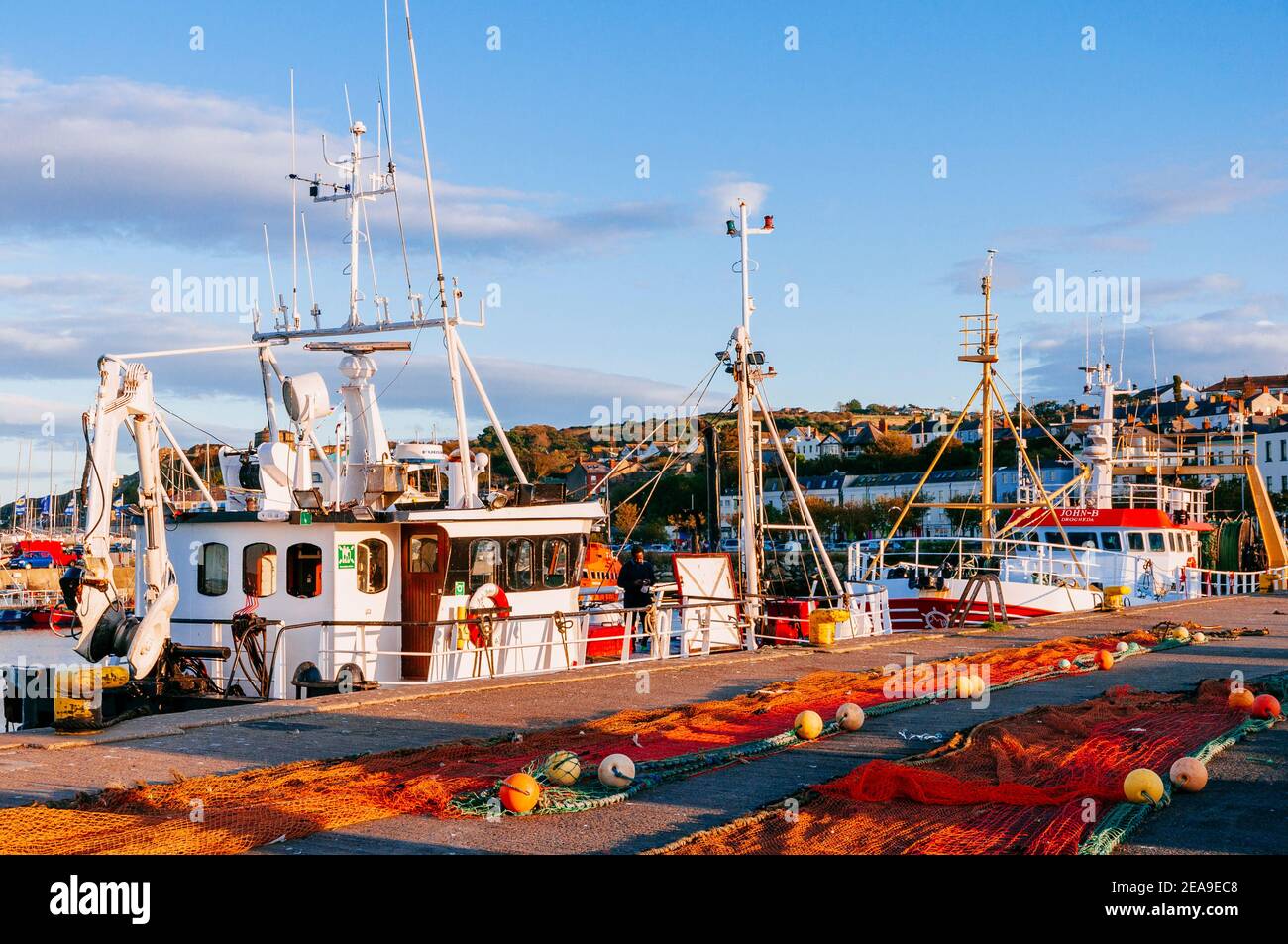 Fishing nets dry up on the pier, Howth Fishery Harbour. Howth, County ...