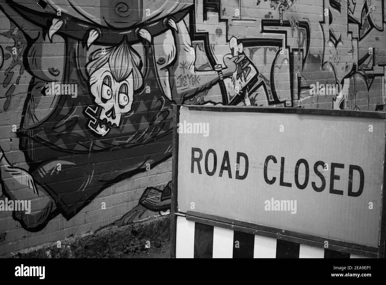 Grafitti on road sign Black and White Stock Photos & Images - Alamy