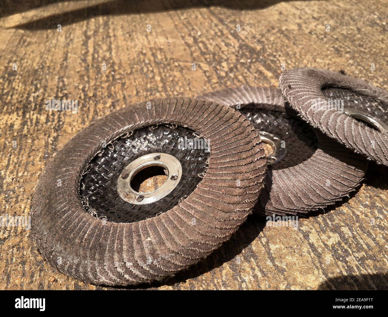 Used worn discs for angular grinding Stock Photo - Alamy