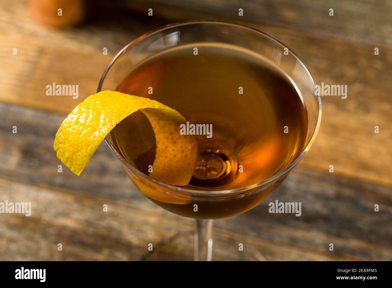 Boozy Alcoholic Scotch Bobby Burns Cocktail with a Lemon Peel Stock ...