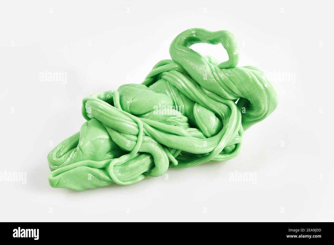 Green toy called smart gum. Stretchable antistress toy for relaxation ...