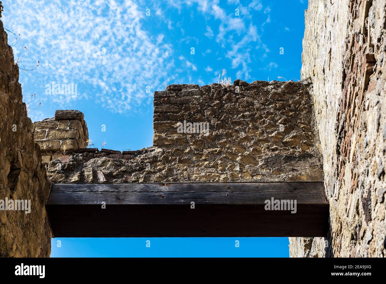 Ancient wall of limestone of a house in the ruins of the ancient ...
