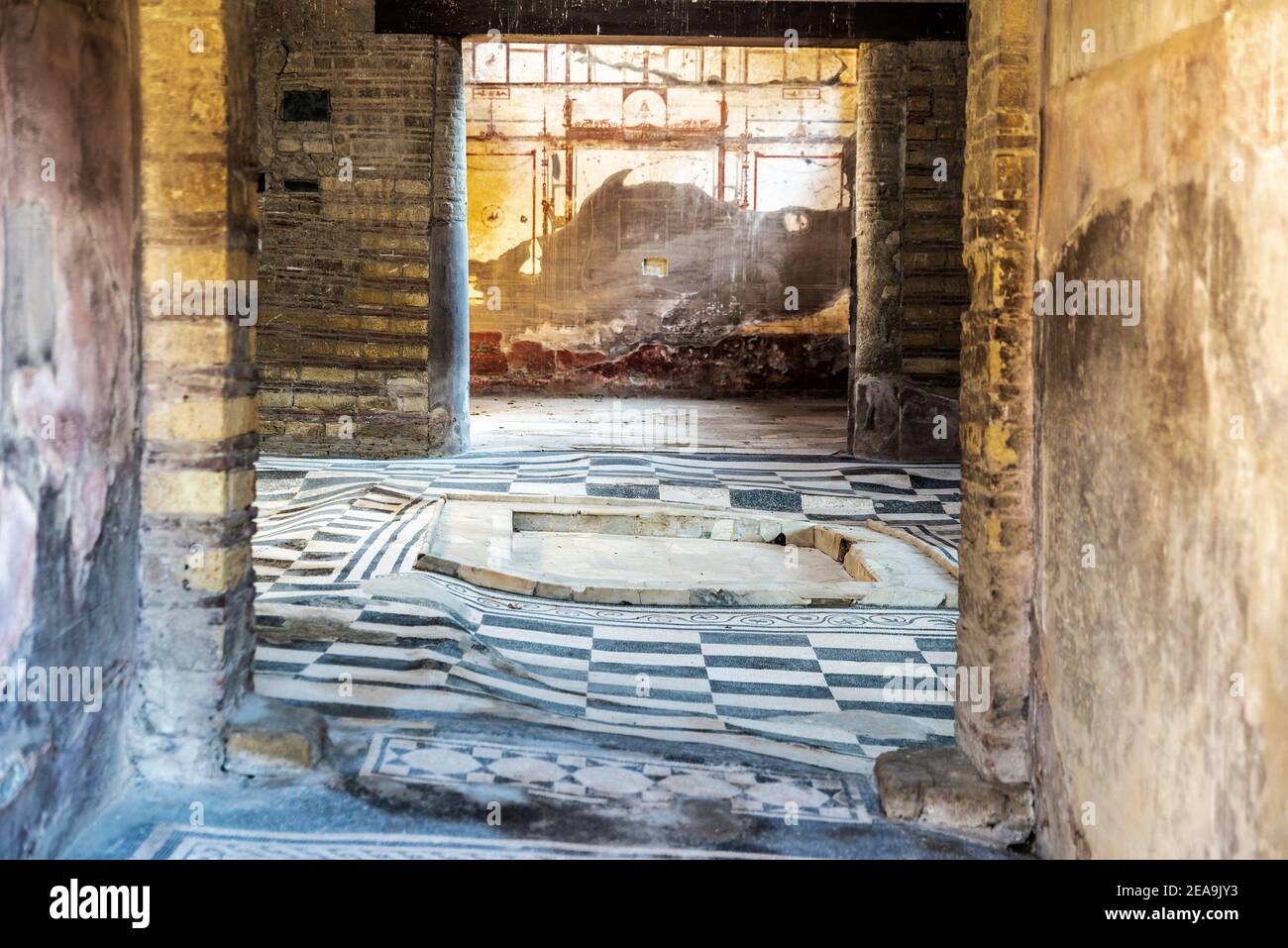 Interior of a house with its marble floor in the roman ruins of the ...