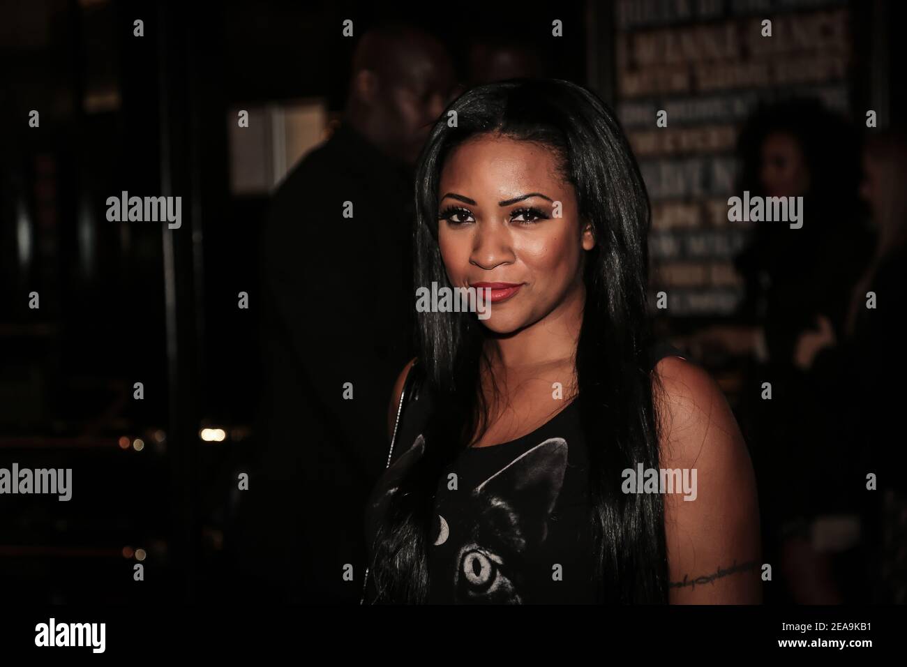 Celina Cherry posing for photos on the red carpet before attending the ...