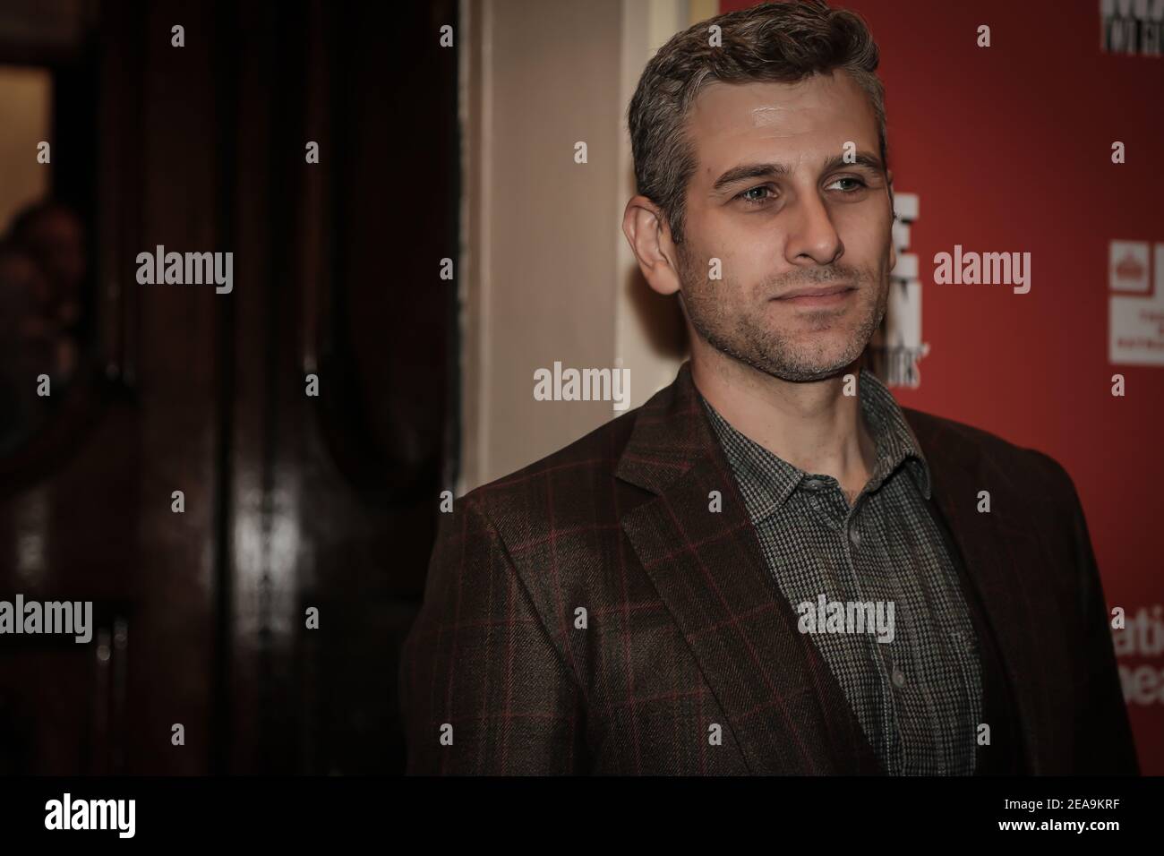 Terry Mynott posing for photos on the red carpet before attending the ...