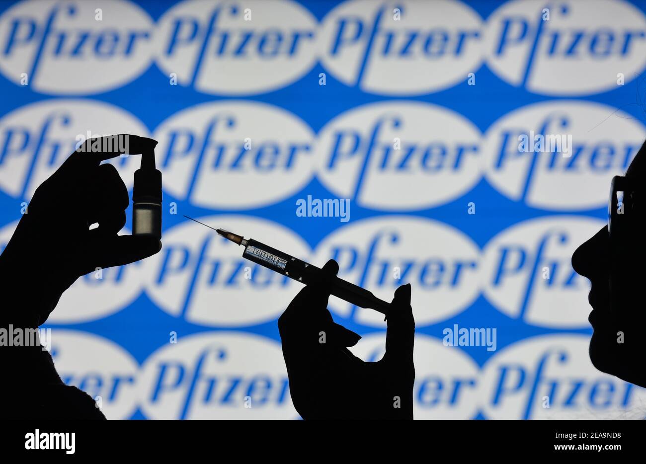 In this photo illustration a silhouette of a man holding a medical ...