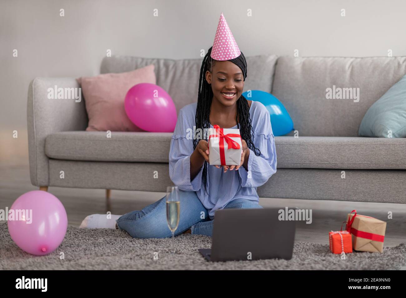 Laptop screen showing gift hi-res stock photography and images - Alamy