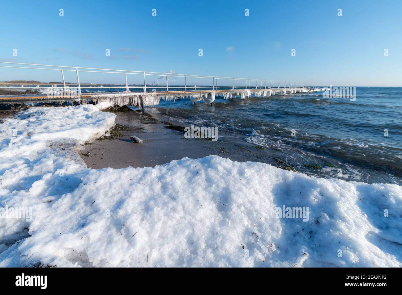 Frozen pier and snow in beach day time at Denmark Stock Photo - Alamy