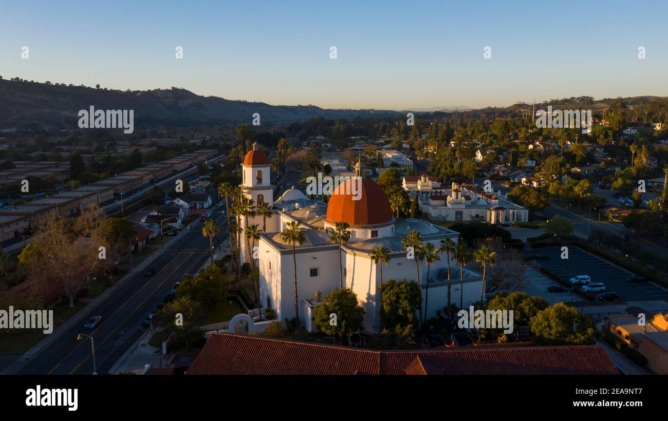 Sunset aerial view of the Spanish Colonial era mission and surrounding ...