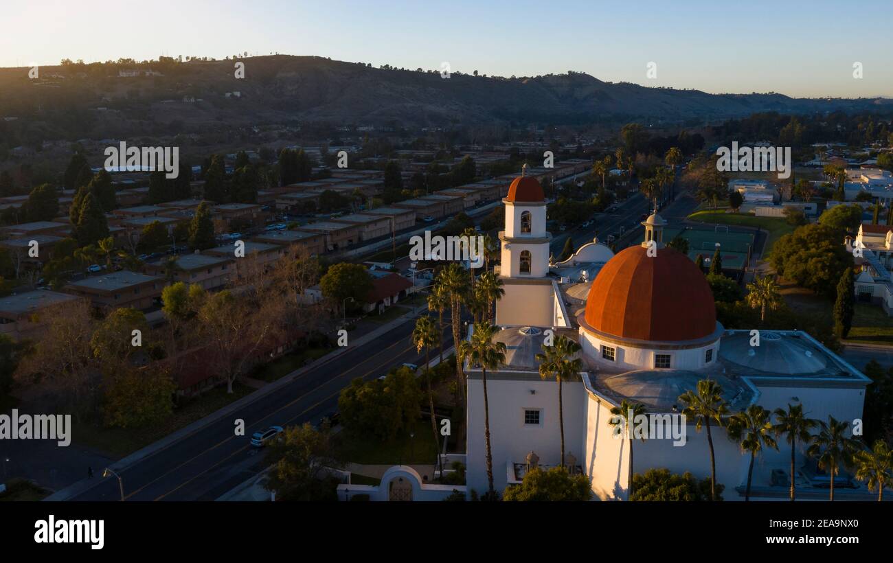 Sunset aerial view of the Spanish Colonial era mission and surrounding ...