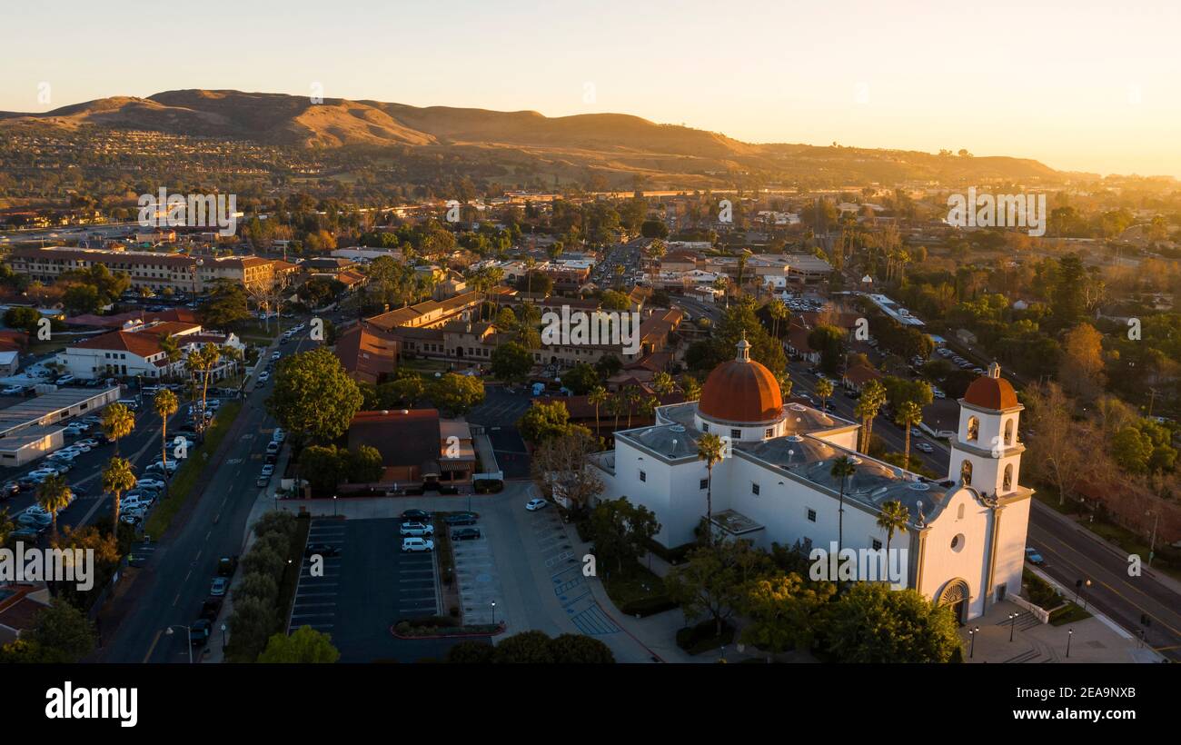 Sunset aerial view of the Spanish Colonial era mission and surrounding ...