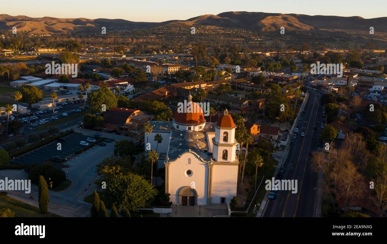 Sunset aerial view of the Spanish Colonial era mission and surrounding ...