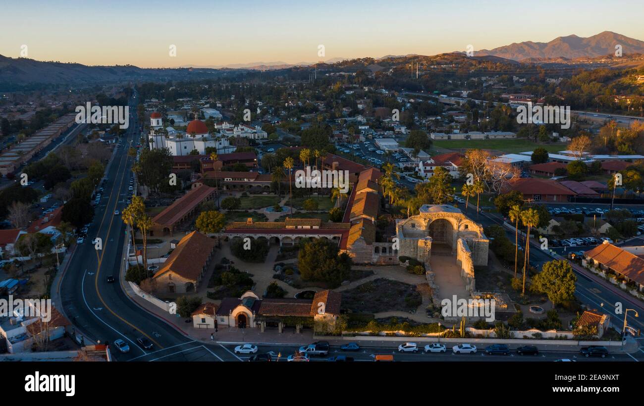 Sunset aerial view of the Spanish Colonial era mission and surrounding ...