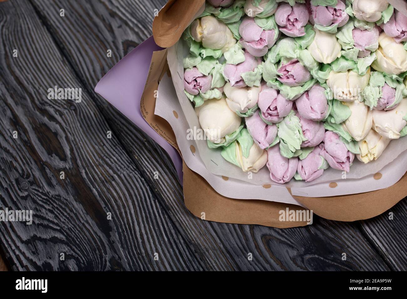 Zephyr bouquet. Marshmallow tulips are collected in a bouquet and ...