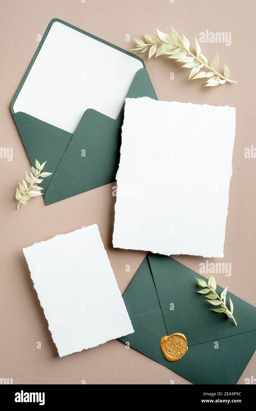 Wedding details, wedding envelope, wedding invitations on pastel beige ...