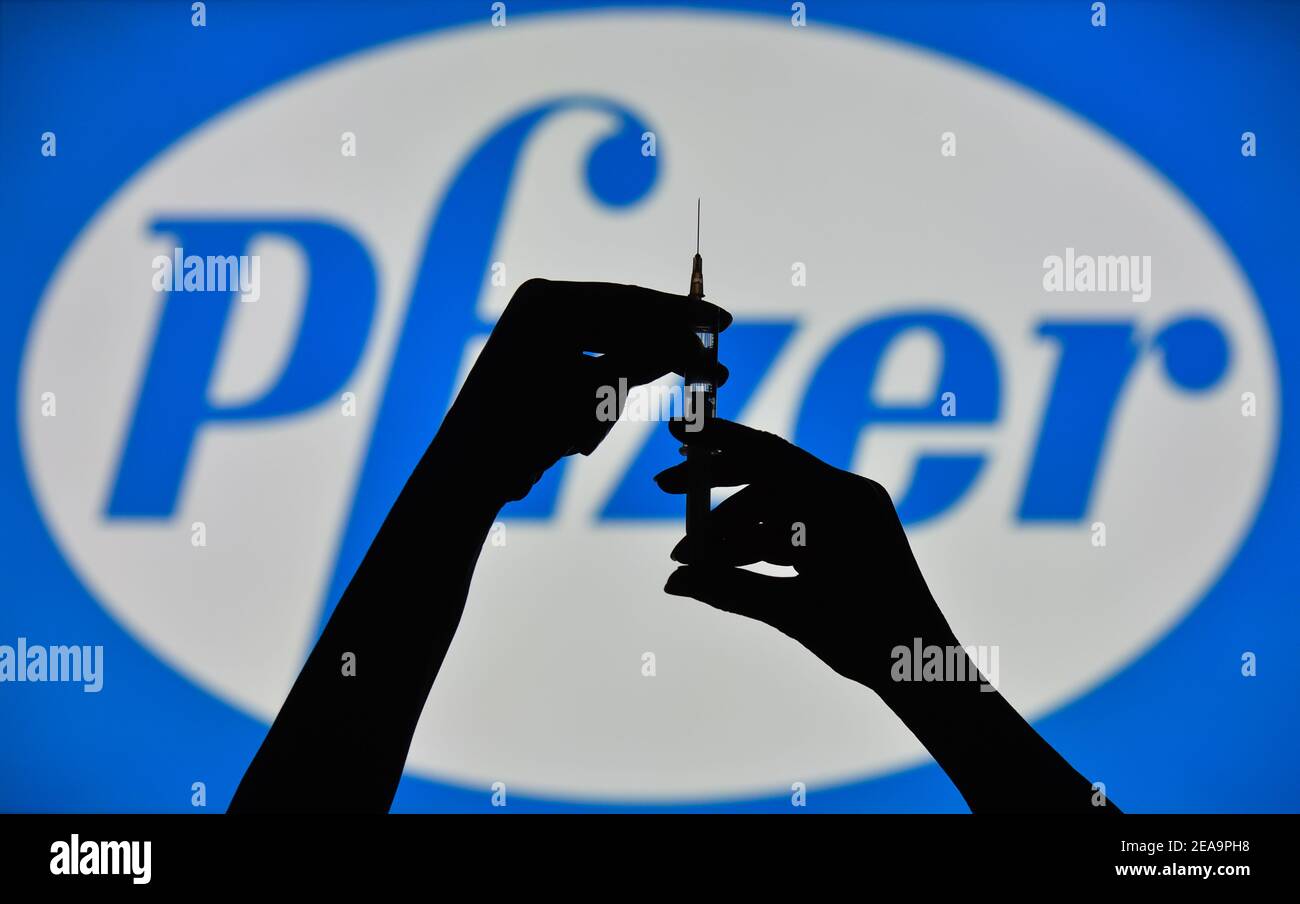 In this photo illustration a silhouette of hands holding a medical ...