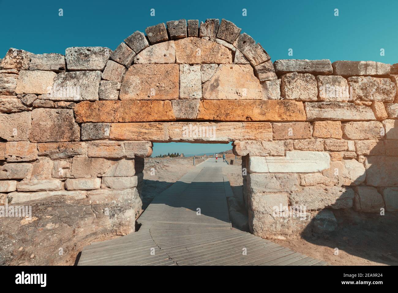 Entrance gate to the restored ancient city with archaeological ...