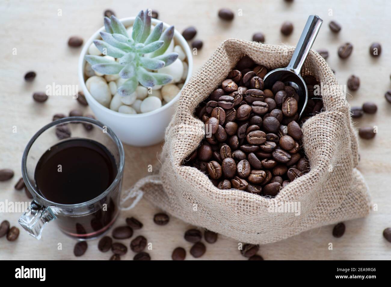 Coffee beans in a rustic jute bag Stock Photo - Alamy