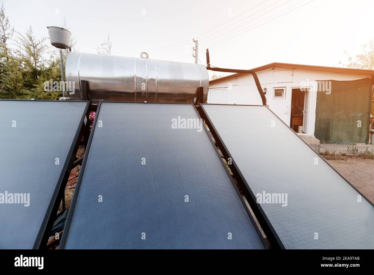 Solar panels for heating water in a barrel with rainwater collection in ...