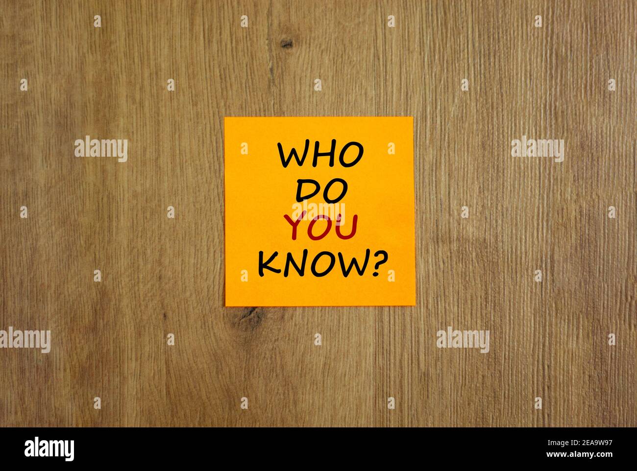 Who do you know symbol. Yellow sheet of paper. Words 'who do you know ...