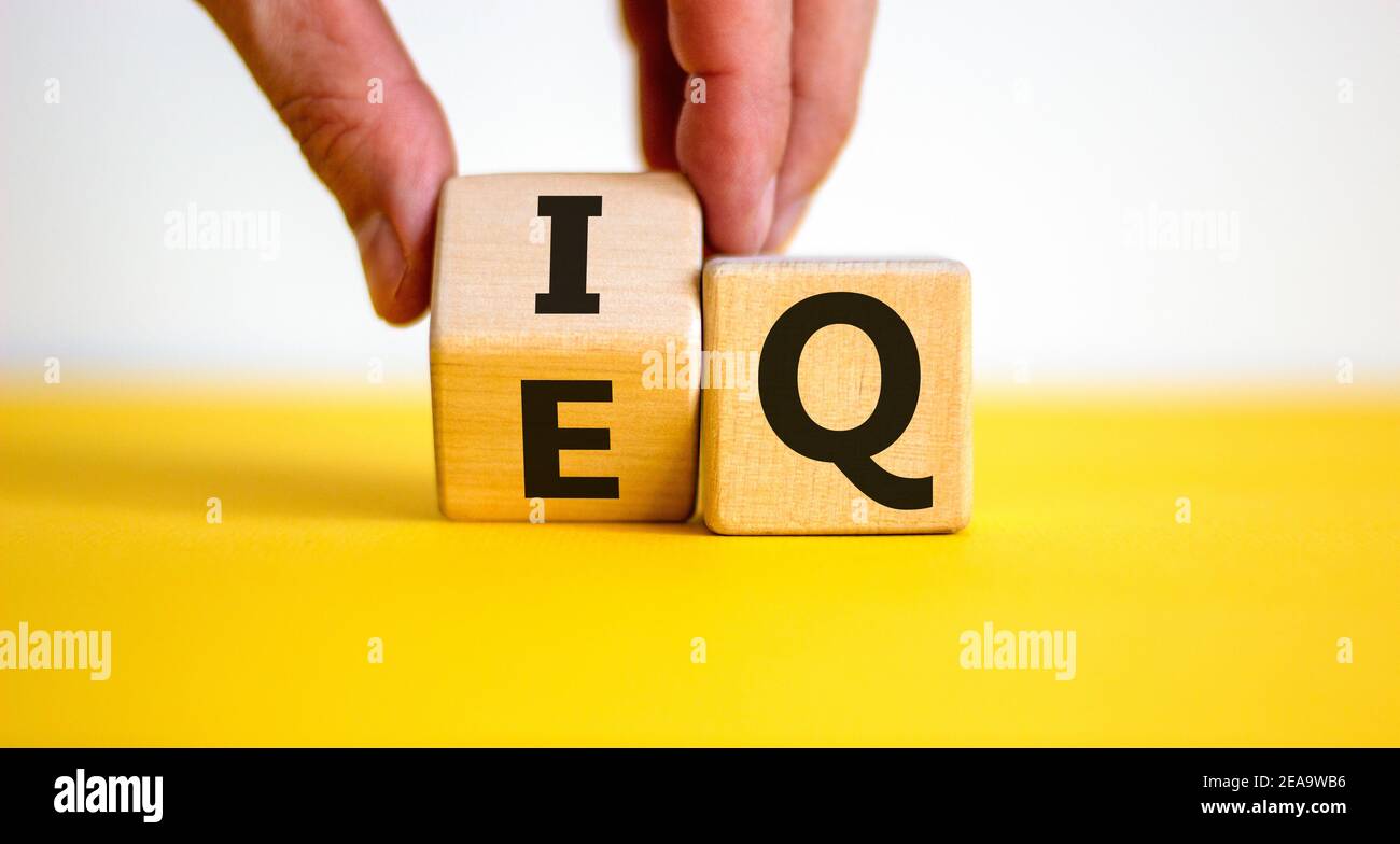 IQ or EQ symbol. Psychologist flips a cube, changes words IQ ...