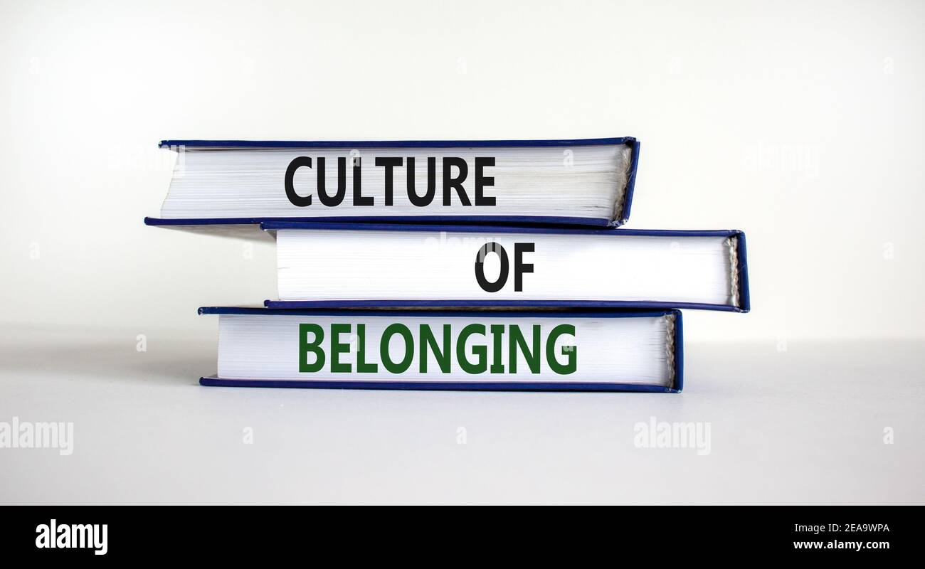 Culture of belonging symbol. Books with words 'culture of belonging' on ...