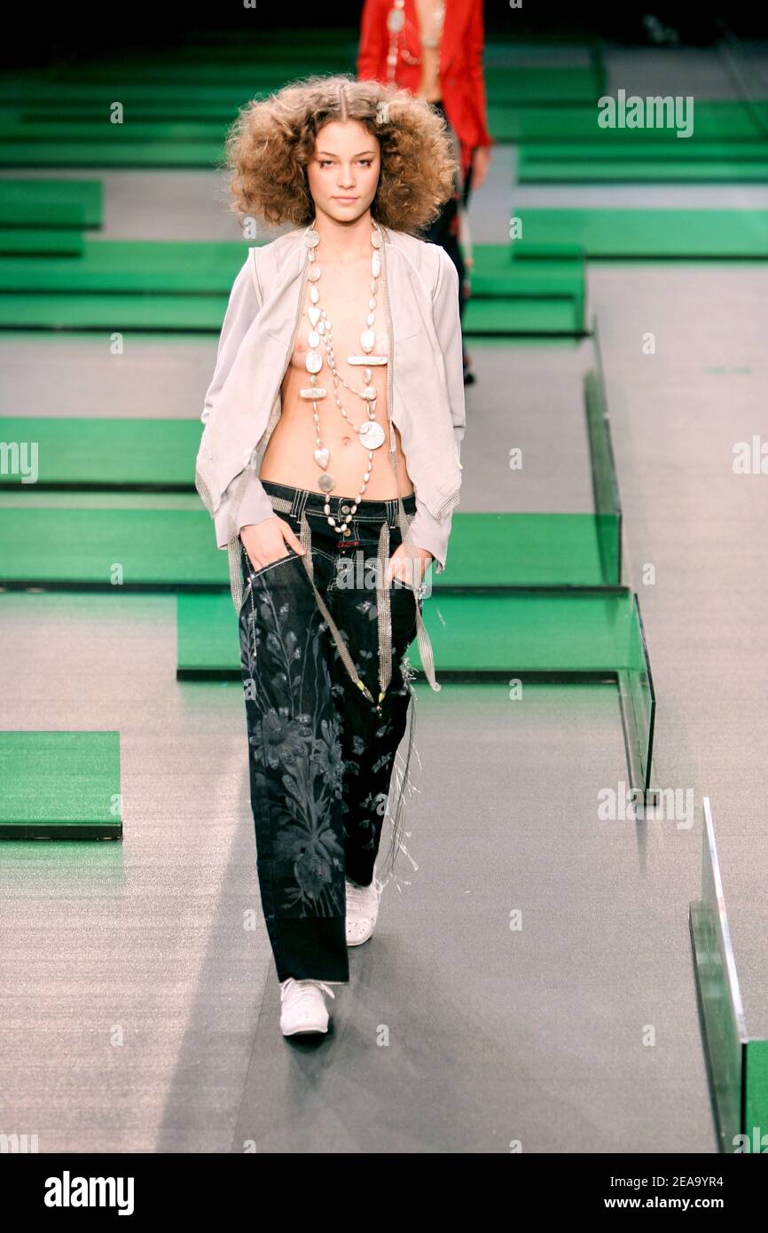 A model displays a creation by French fashion designers Marithe ...