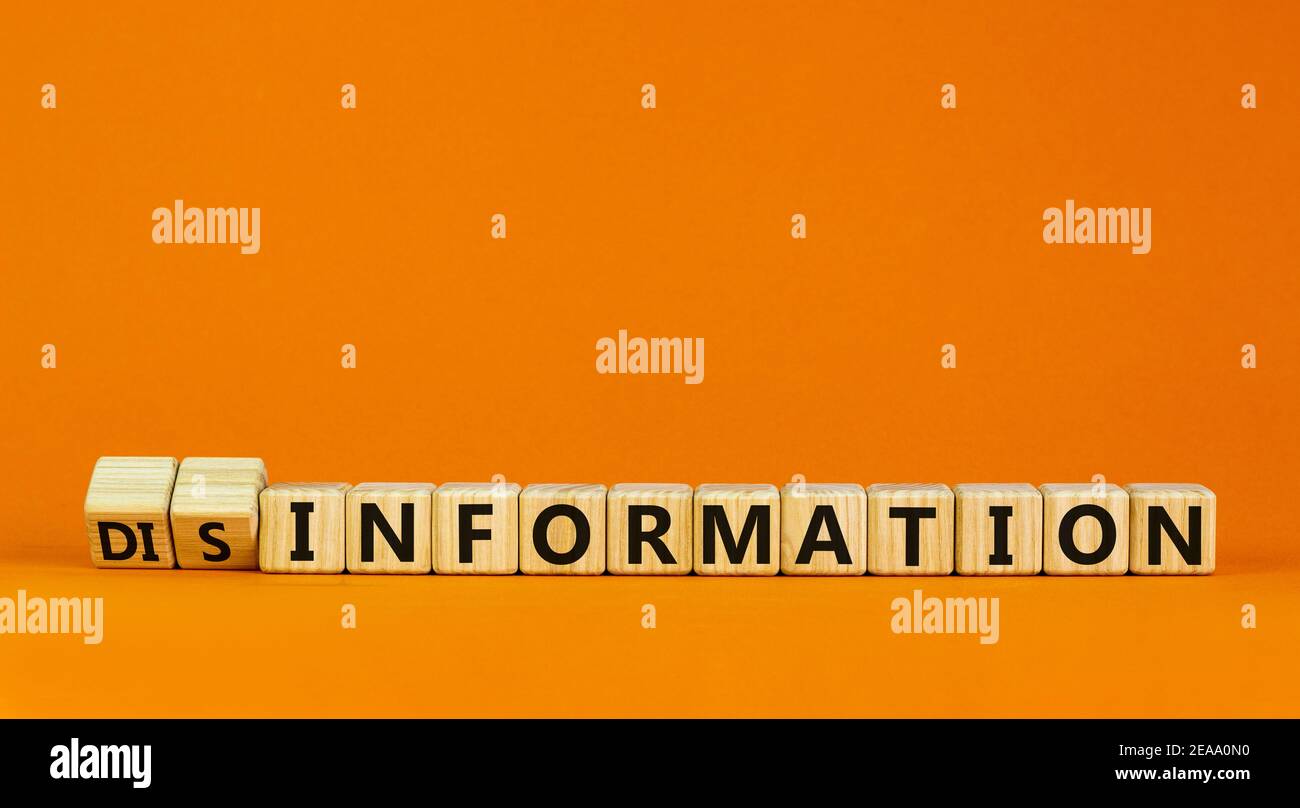 Information or disinformation symbol. Turned cubes and changed words ...