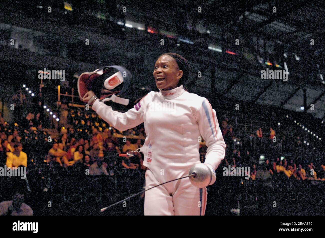 France's women's Epee Laura Flessel-Colovic celebrates to qualify on ...