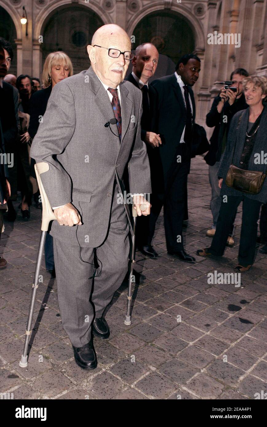 French photographer Willy Ronis attends the opening ceremony of his ...