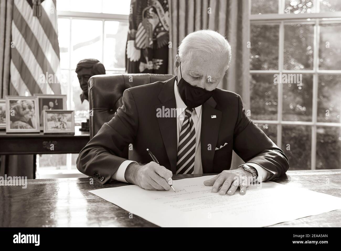 President Joe Biden signs the commission for Lloyd Austin to be ...