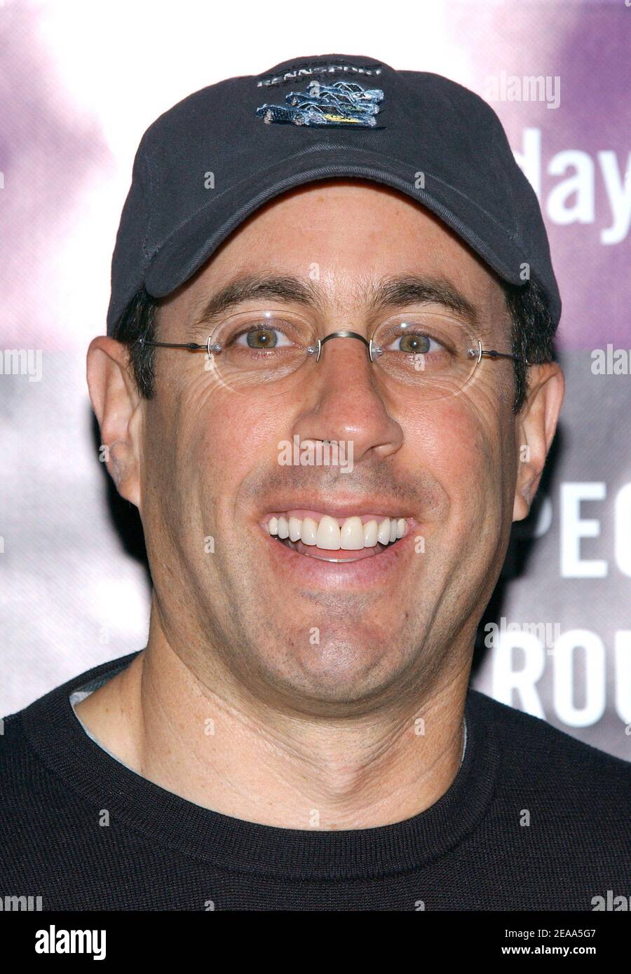 "Comedian Jerry Seinfeld poses for pictures as he arrives at the ...